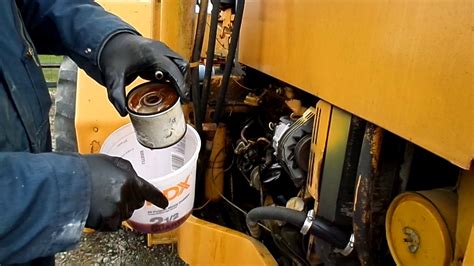 John Deere Fuel Filter Replacement On The A Backhoe Youtube