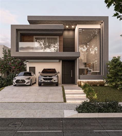 Two Cars Parked In Front Of A Modern House