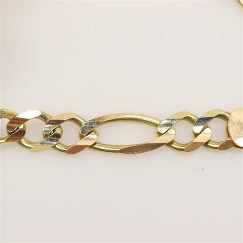 14kt Two Toned Gold Name Plate Figaro Link Bracelet Property Room