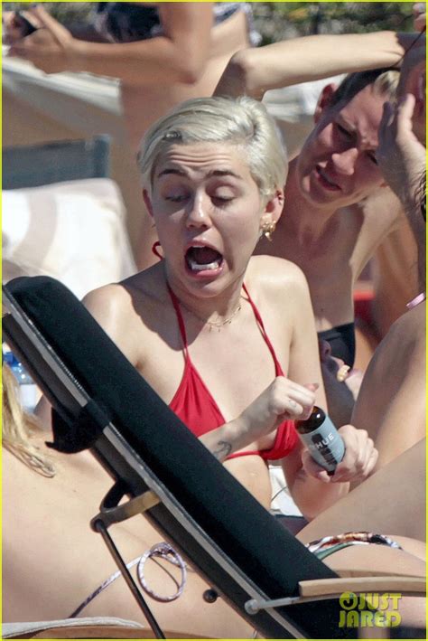 Miley Cyrus Displays Her Amazing Bikini Body Douses Herself With Water