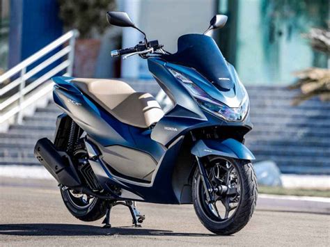 Nova Honda PCX 160 2023 fotos ficha técnica potência consumo e