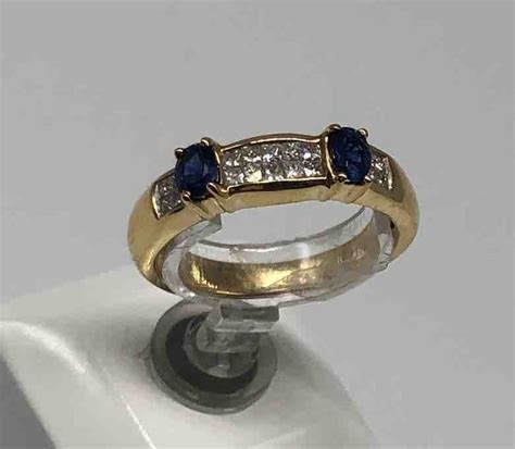 Small Rectangular Of Princess Cut Diamonds With Oval Sapphires Style