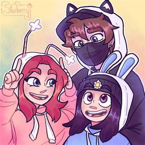 Three People Wearing Masks And Hoods Standing Next To Each Other