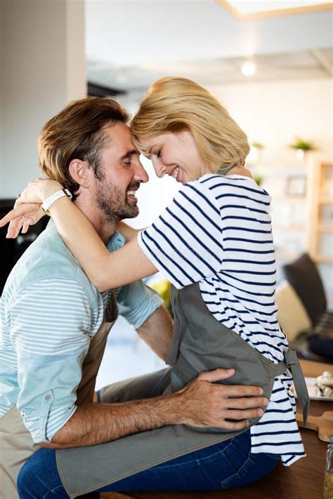 Spontaneous Romantic Couple Making Love In Kitchen While Preparing Food Stock Image Image Of