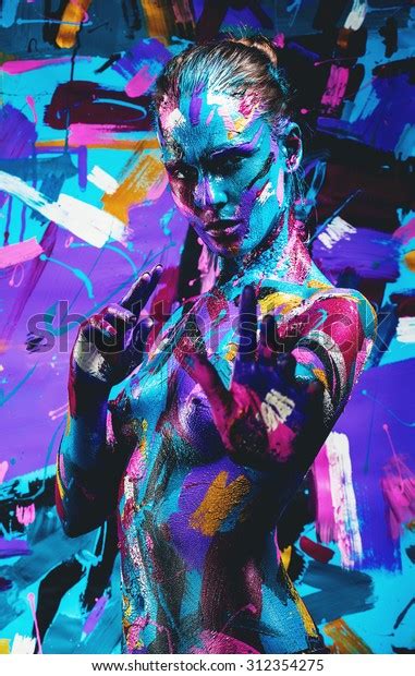 Mystic Naked Woman In Body Art On Abstract Background