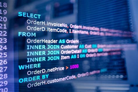 sql structured query language code on computer monitor and server room background stock image