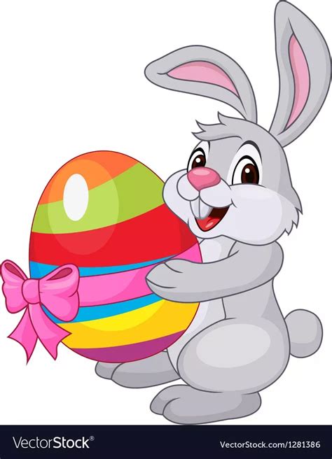 An Easter Bunny Carrying A Large Colorful Egg