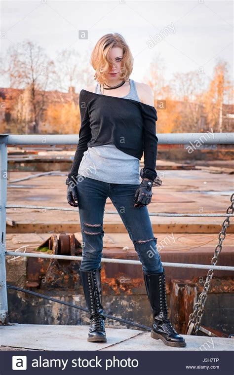 Download This Stock Image Young Stylish Aggressive Looking Woman Lace Up Boots Black Leather