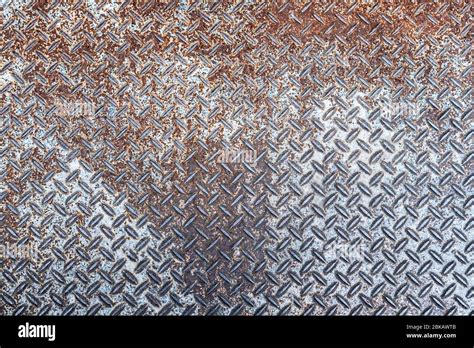 Old And Rusted Metal Diamond Plate Pattern Texture Background Stock