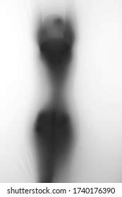 Woman Silhouette Behind Diffuse Screen Naked Stock Photo 1740176390