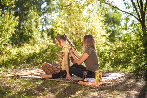 Experienced Masseuse Performs A Relaxing Massage In The Daylight Stock Image Image Of Hands