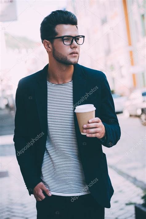 Man Holding Coffee Cup Stock Photo Gstockstudio 119179524