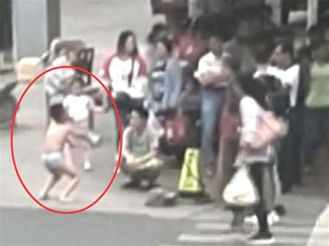Mum Strips Her Son In Public For Touching His Classmates Bottom