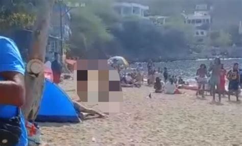 Video Polémica en Taganga por mujer que se paseó completamente desnuda