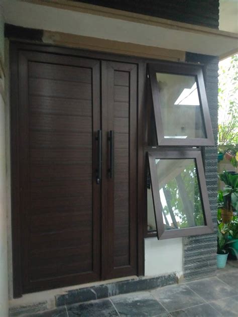 PINTU UTAMA JENDELA Warna Urat Kayu Dari Kusen UPVC Matang