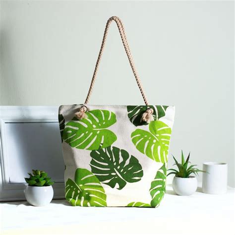 Jual RIENS COLLECTIONS TOTEBAG TALI SUMBU BAHAN KANVAS MOTIF MONSTERA