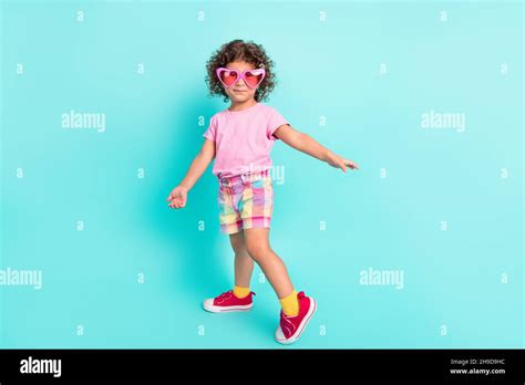 Full Length Body Size View Of Attractive Cheerful Carefree Girl Dancing Isolated Over Bright