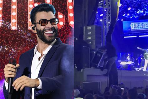 Fã faz loucura invade palco em show de Gusttavo Lima e sofre acidente