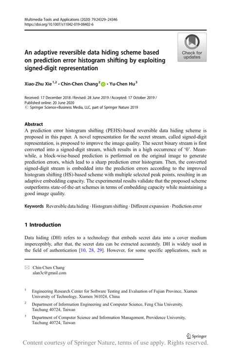 an adaptive reversible data hiding scheme based on prediction error histogram shifting by