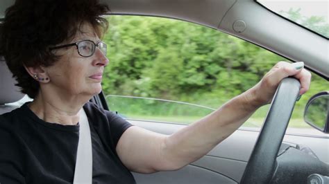 Elderly Woman Driving Car Stock Video Footage 00 14 SBV 301159143