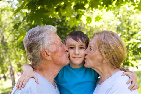 Jungen mit Großeltern Stock Bild Colourbox