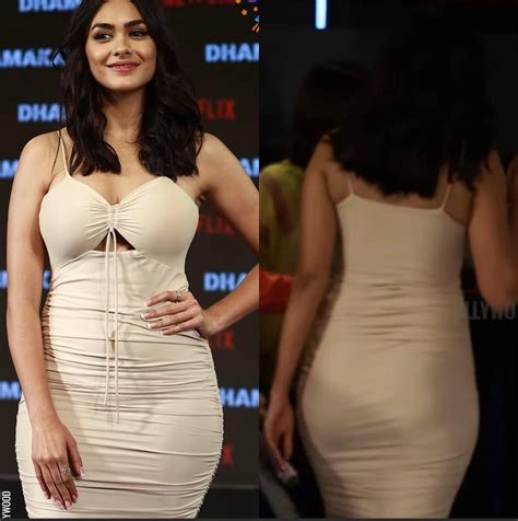 Mrunal Thakur Draws Attention In A Silver Bodycon Dress View The Diva