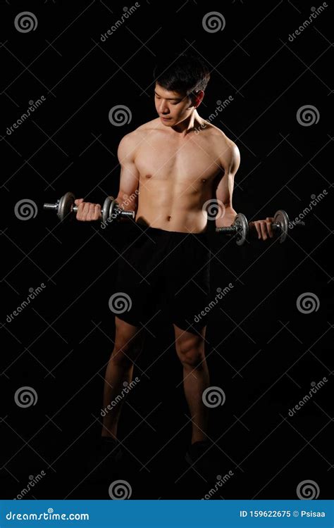 Athletic Muscular Bodybuilder Man With Naked Torso Six Pack Abs Working