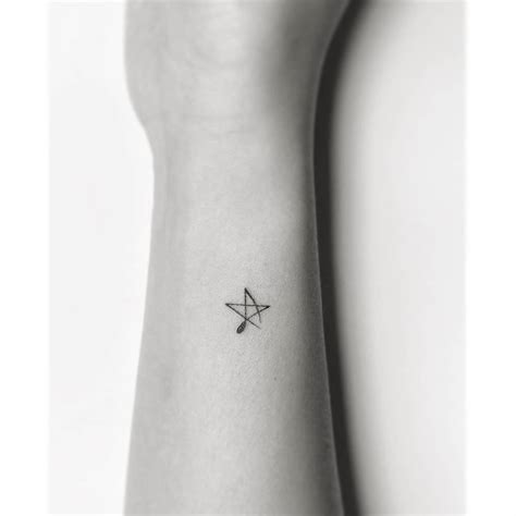 Minimalistic Style Star Tattoo Located On The Wrist