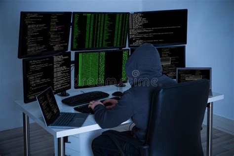 Hacker Using Multiple Computers To Steal Data Stock Photo Image Of