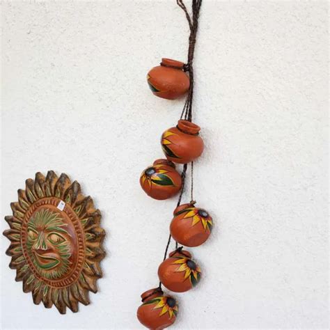Optez pour une suspension de pots en terre cuite déco murale Amadera