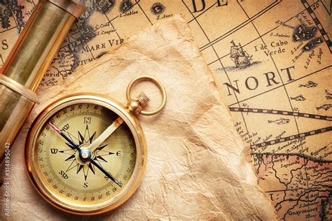 Antique Compass On Ancient Map Made By H Hondius At Stock Photo