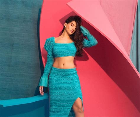 Nora Fatehi Aces Fun Beach Look With This Red Bikini Top And Denim