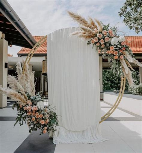 Boho Wedding Arch With White Fabric