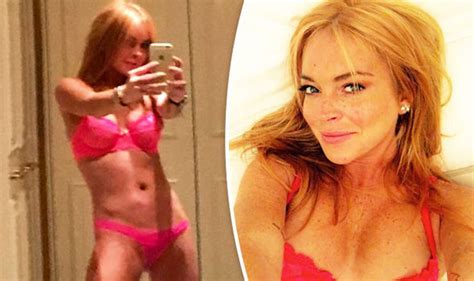 Lindsay Lohan Sends Fans Wild As She Strips Down To Hot Pink Underwear