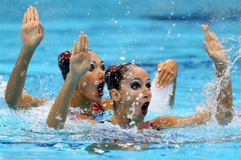 Dive Into Laughter A Collection Of Hilarious Synchronized Swimming Photos