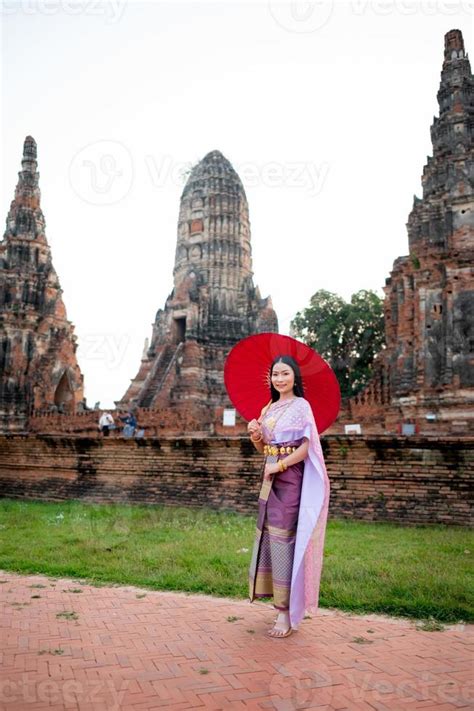 Beautiful Thai Girl In Traditional Dress Costume Red Umbrella As Thai Temple Where Is The Public