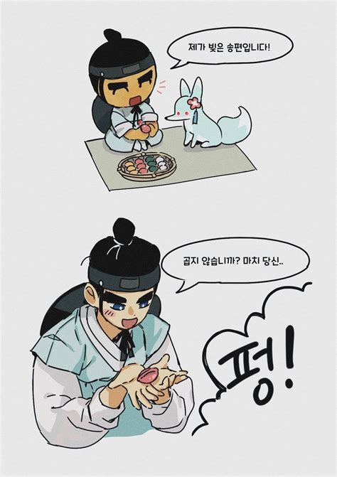 Two People Sitting At A Table Eating Food