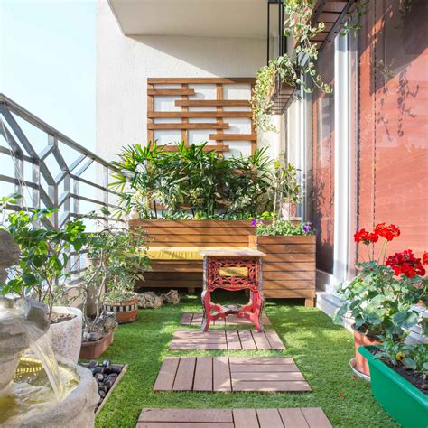 Modern Balcony Design With Wooden Grid Wall And Grass Mat Livspace