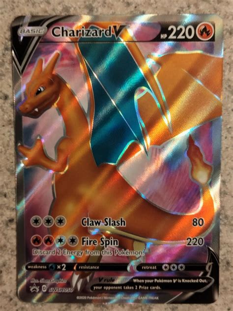Mavin Charizard V SWSH050 FULL ART Champion S Path BLACK STAR PROMO