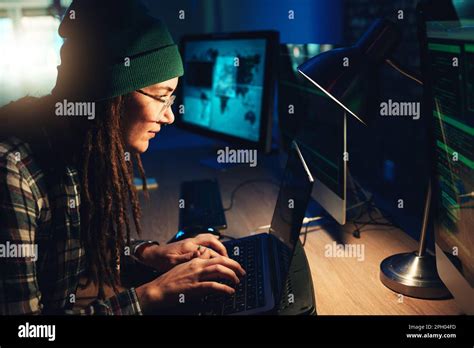 woman laptop and hacker typing in home with software data programming or cybersecurity