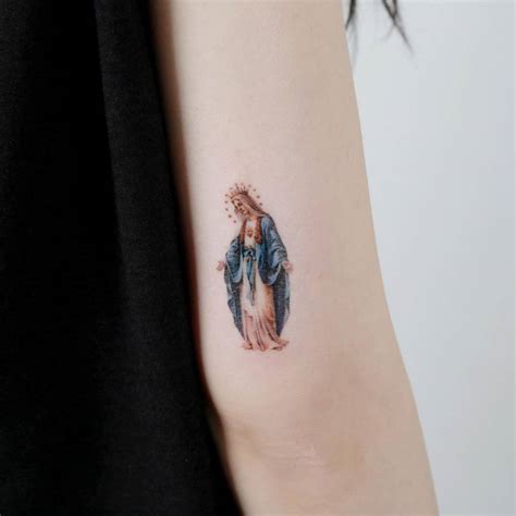 Micro Realistic Virgin Mary Tattoo On The Tricep