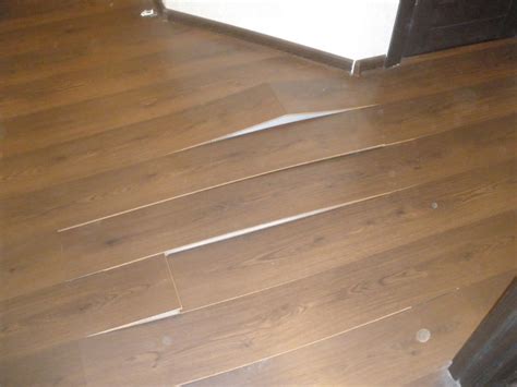 How To Repair Swollen Laminate Flooring Easily