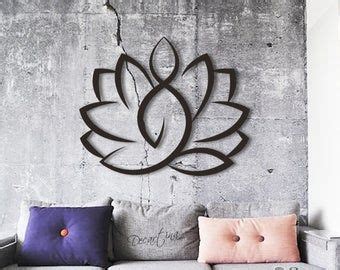 A Living Room Filled With Furniture And A Large Metal Lotus Decoration