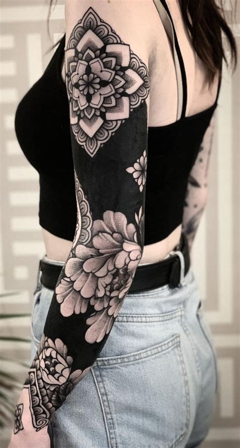These Striking Solid Black Tattoos Will Make You Want To Go All In