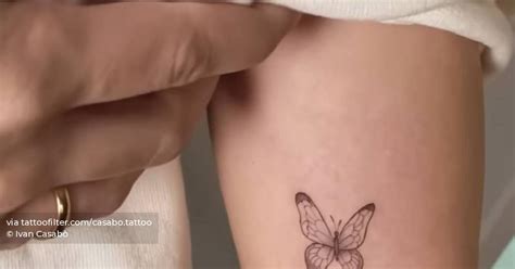 Fine Line Butterfly Tattoo On Laura Escanes Inner Arm