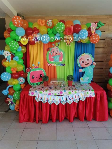 A Birthday Party With Balloons And Decorations