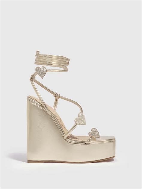 CUCCOO Baddie Collection Sandalias cuña de color metálico con diamante