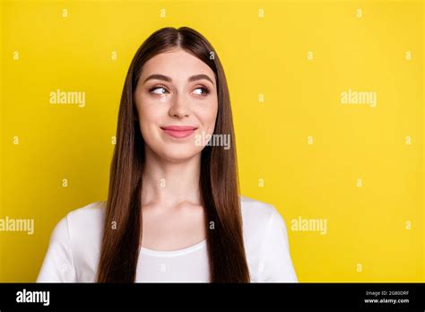 Portrait Of Attractive Cheerful Minded Girl Looking Aside Thinking Copy