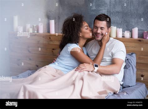 Relaxed Couple Kissing In Bed Hi Res Stock Photography And Images Alamy