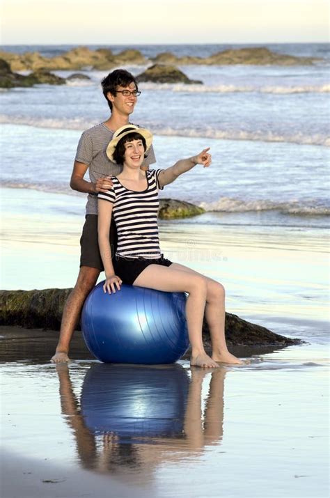 Young Couple With Fitness Ball On Beach Stock Image Image Of Caucasian Happiness 19772315